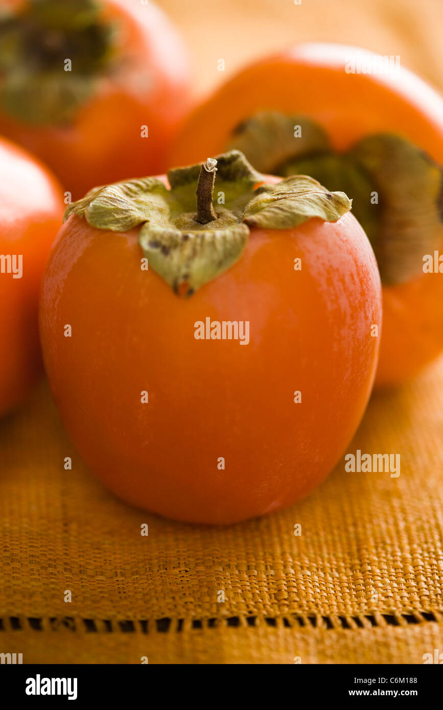 4 persimmons hi-res stock photography and images - Alamy