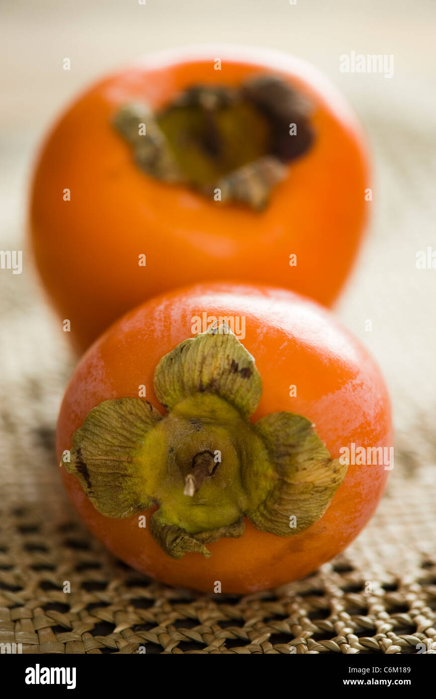 Persimmon in still life hi-res stock photography and images - Alamy
