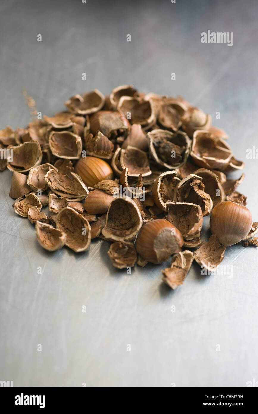 Hazelnuts and broken nutshells Stock Photo - Alamy