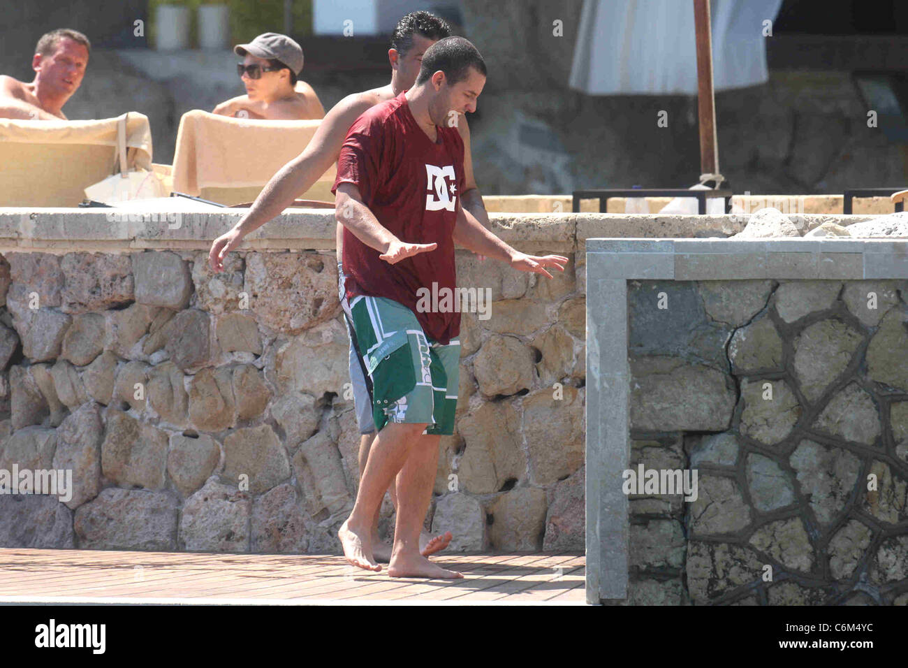 Adam Sandler goes swimming with Grown Ups stars Mallorca Island, Spain ...