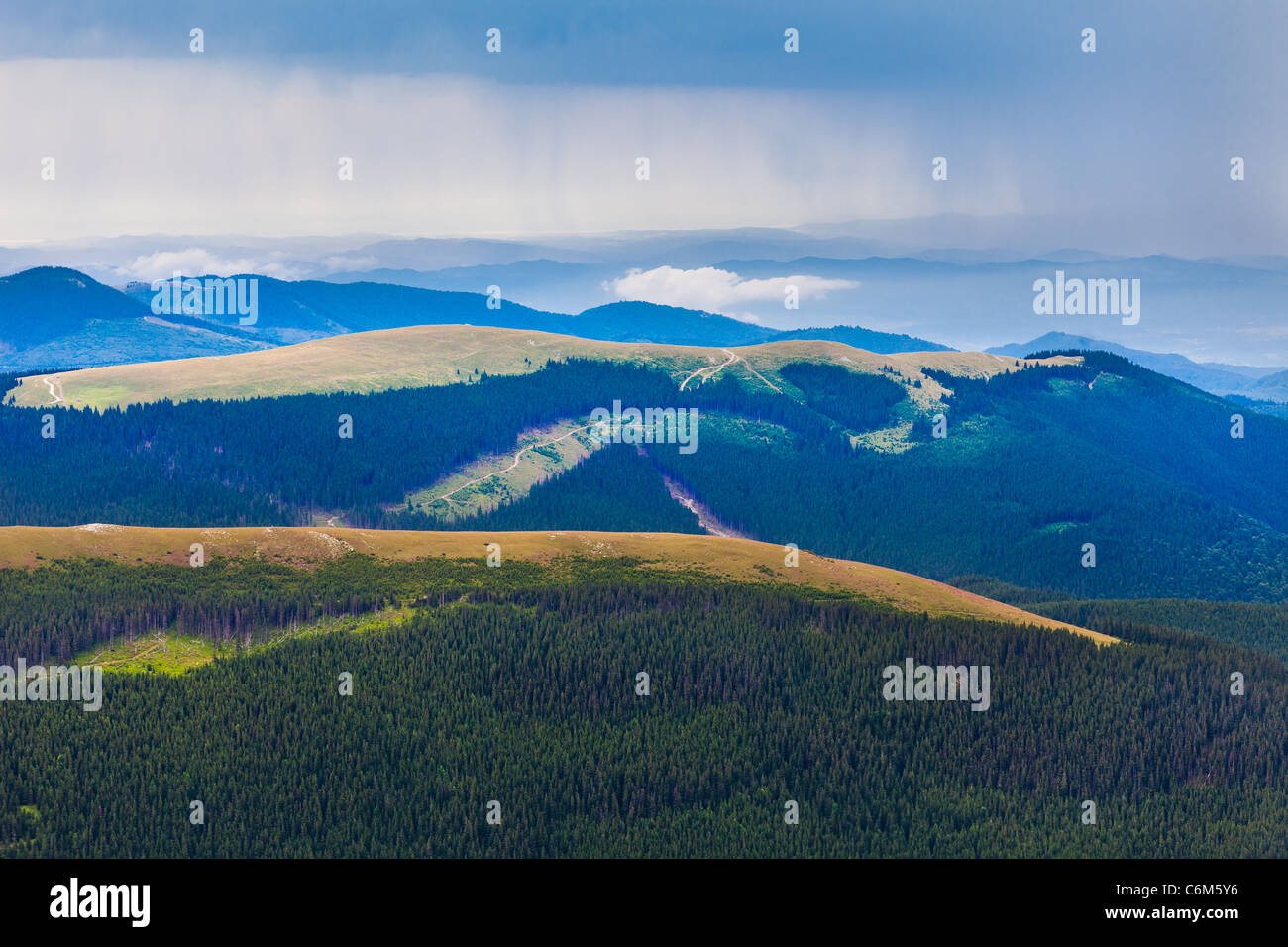 Landscape of Parang mountains in Romania, in summer with a heavy rain ...