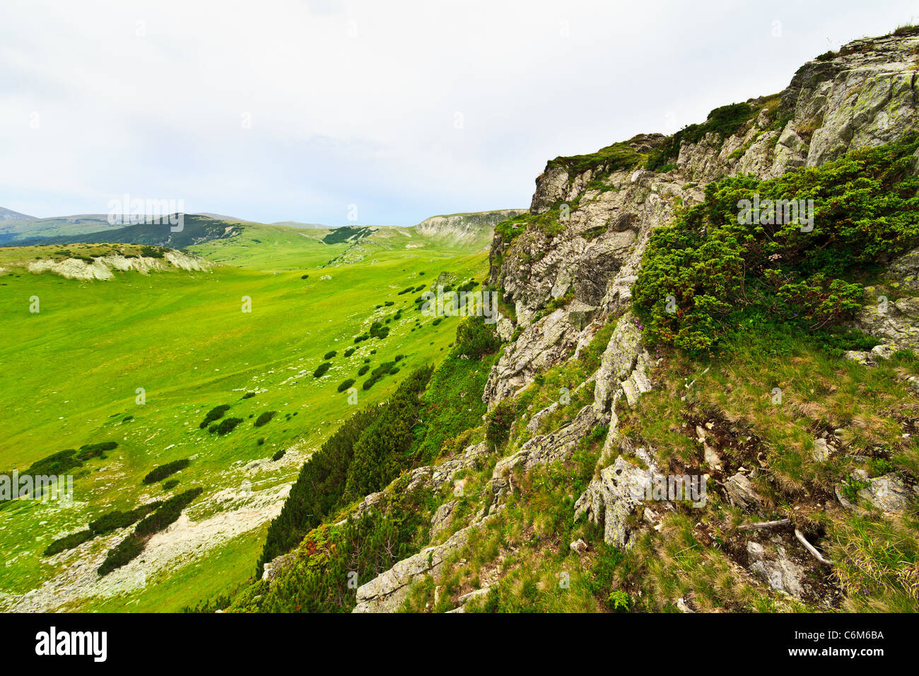 Landscape with a rocky cliff from Parang mountains in Romania Stock ...