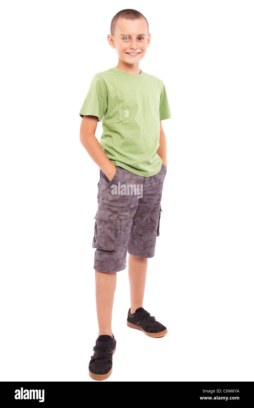 Full length portrait of a child standing, isolated on white background ...
