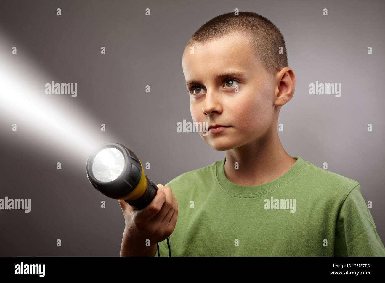 Child, flashlight, face hi-res stock photography and images - Alamy