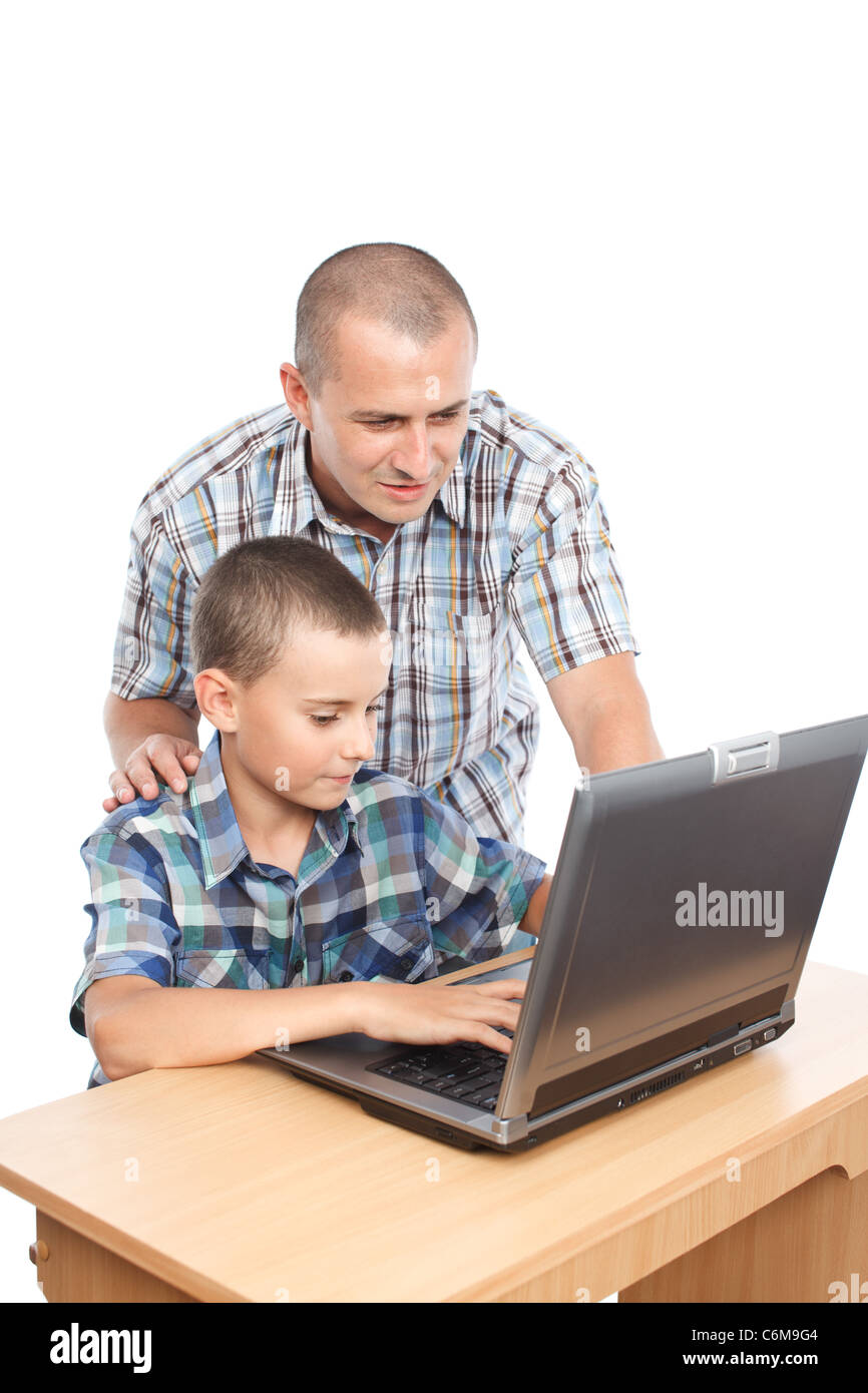 Father and son at the laptop, isolated on white background Stock Photo ...