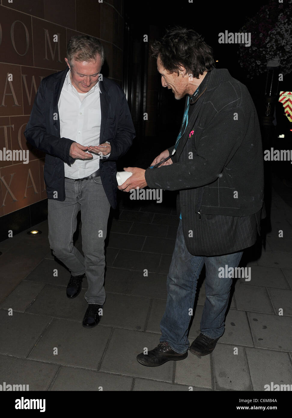 X Factor judge Louis Walsh gives a homeless man Â£20 as he leaves 'C ...