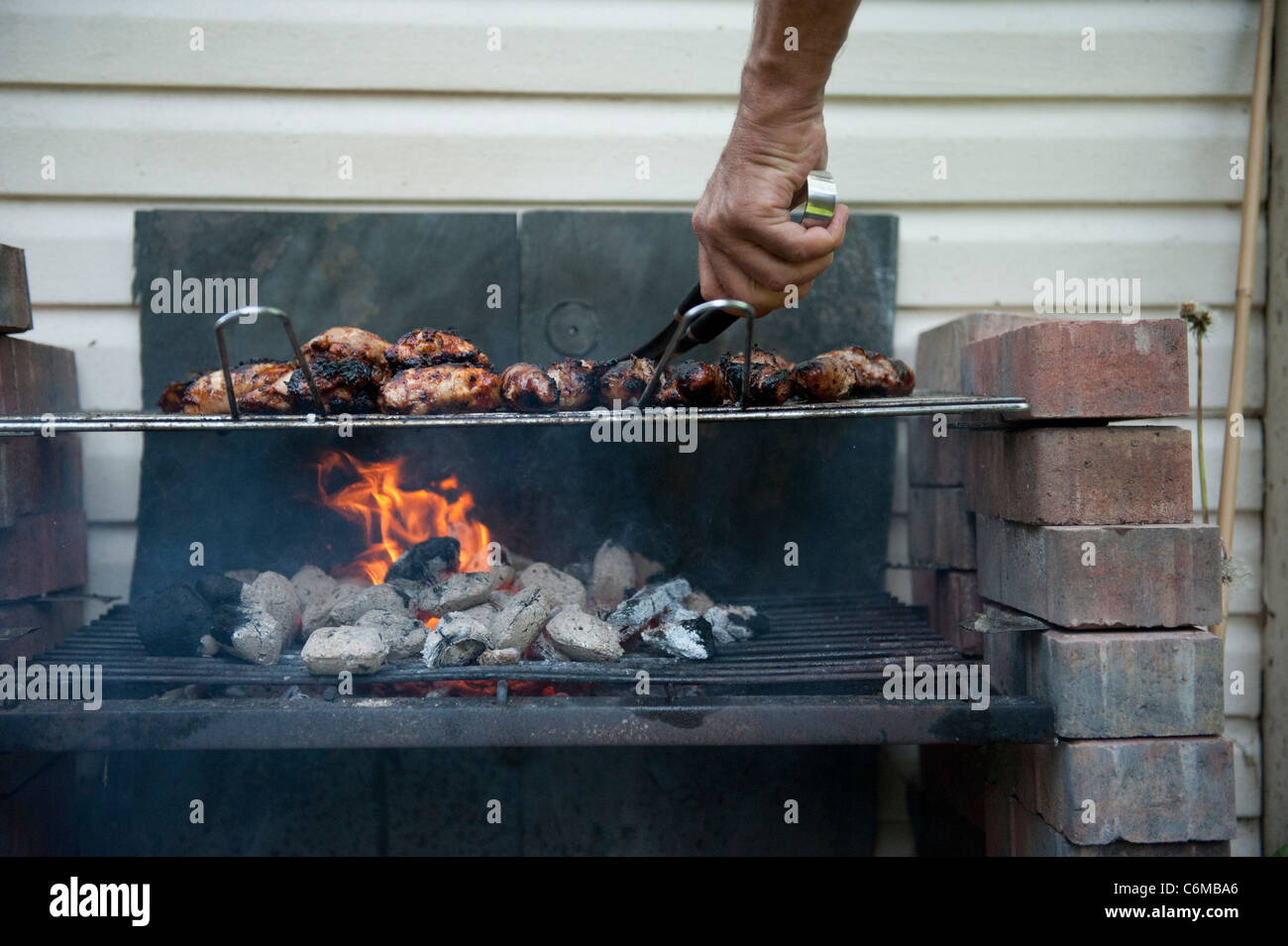 Barbecue burnt sausages hi-res stock photography and images - Alamy