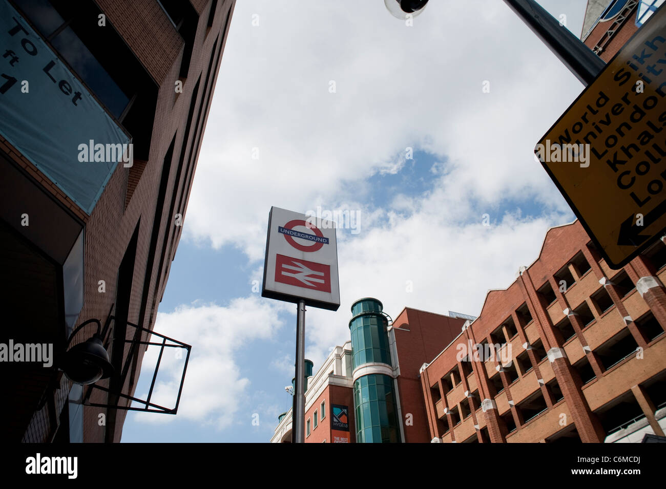 Underground tube and rail sign outside the station in Harrow On the ...