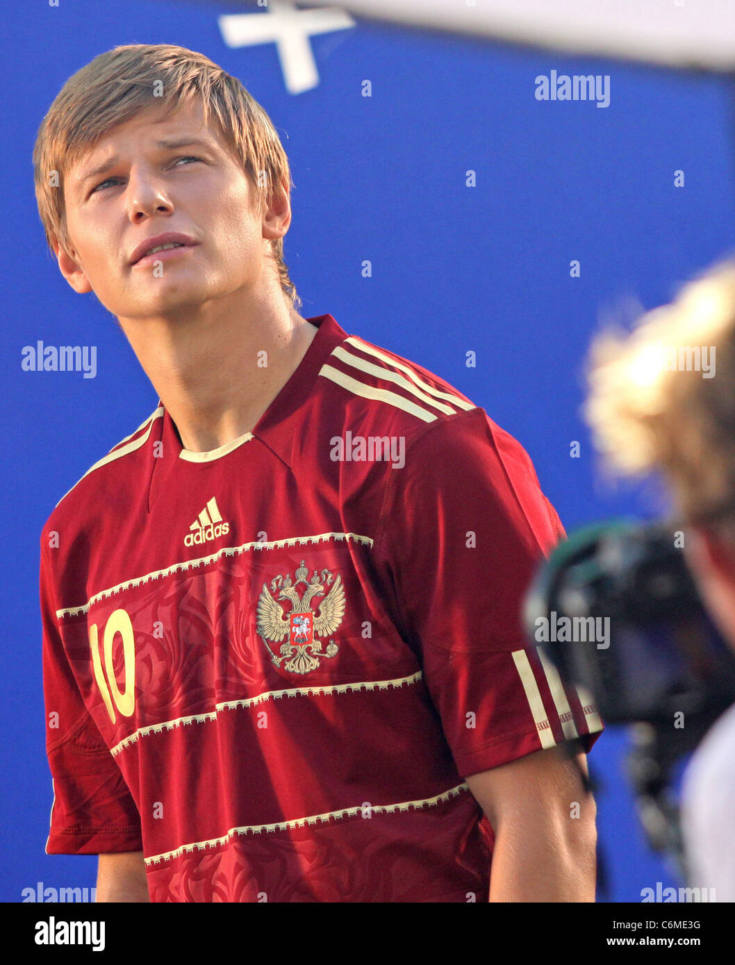Russian footballer Andrei Arshavin participating in a film clip ...
