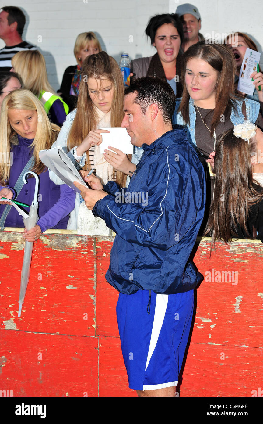Hollyoaks star Nick Pickard signs autographs at a charity football ...