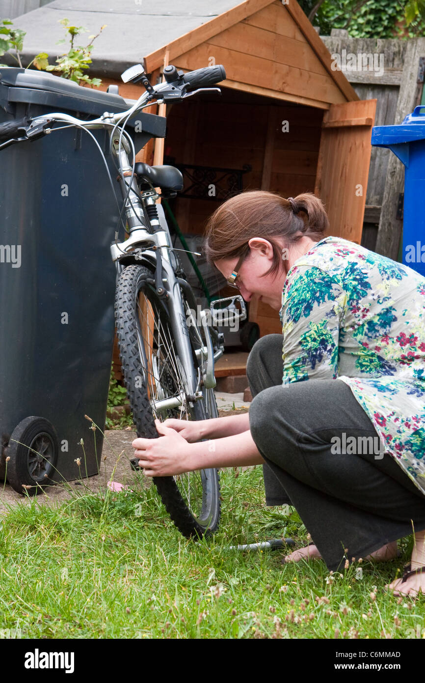 Inflating tyre hi-res stock photography and images - Alamy
