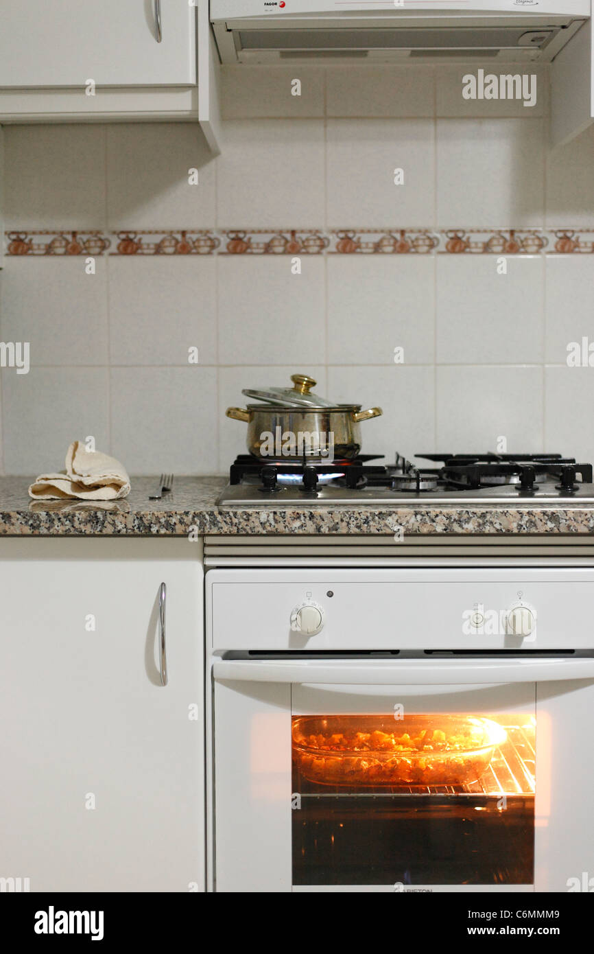 Food cooking in the oven Stock Photo - Alamy