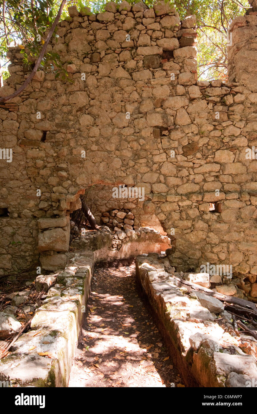 Stone wall with arch along path through the ruins of Olympos, Turkey ...