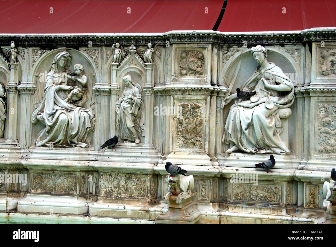 Fonte Gaia (the fountain of joy) located at the Piazza del Campo, Siena ...