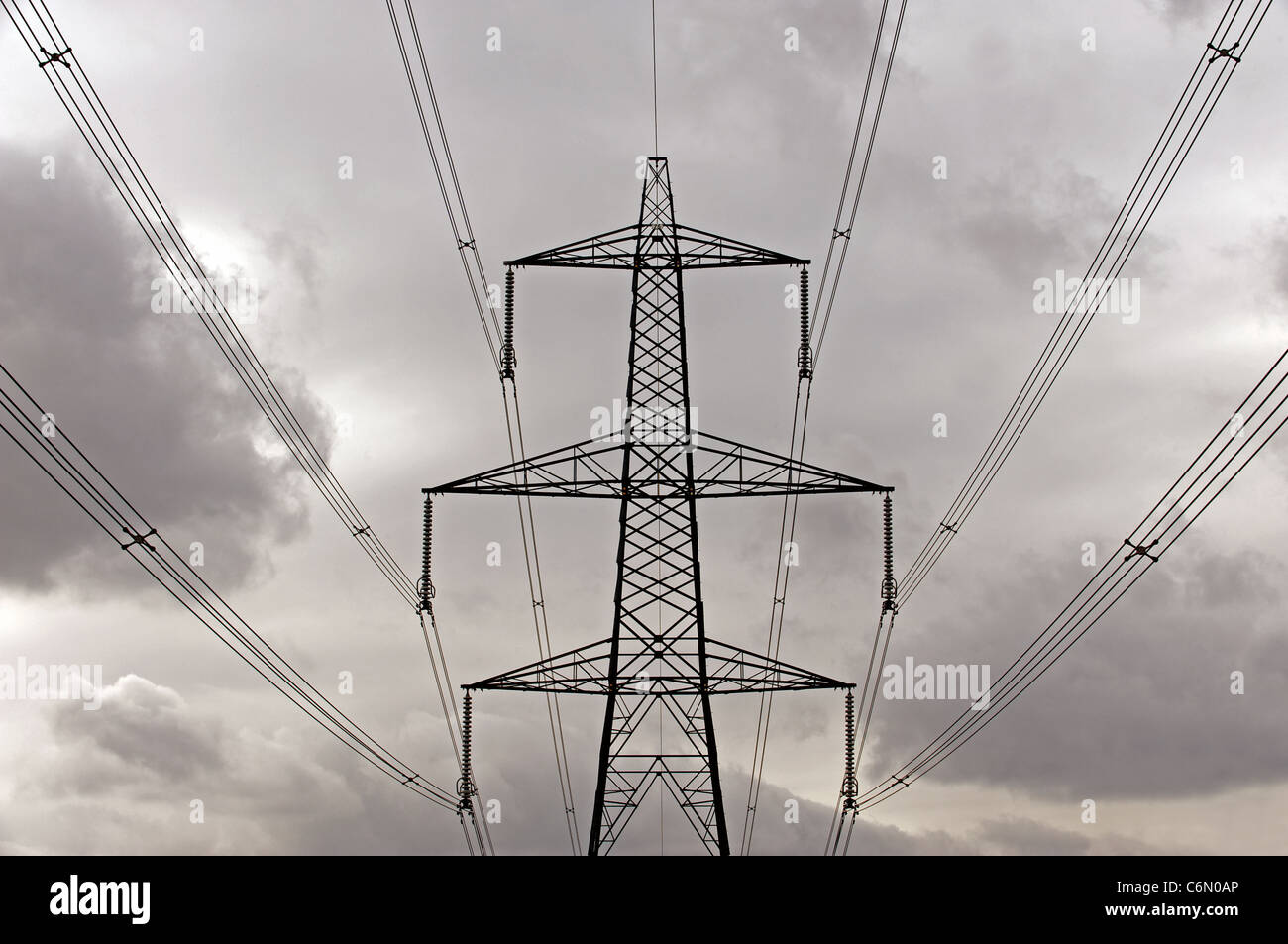 High-voltage electricity pylons and lines Stock Photo - Alamy