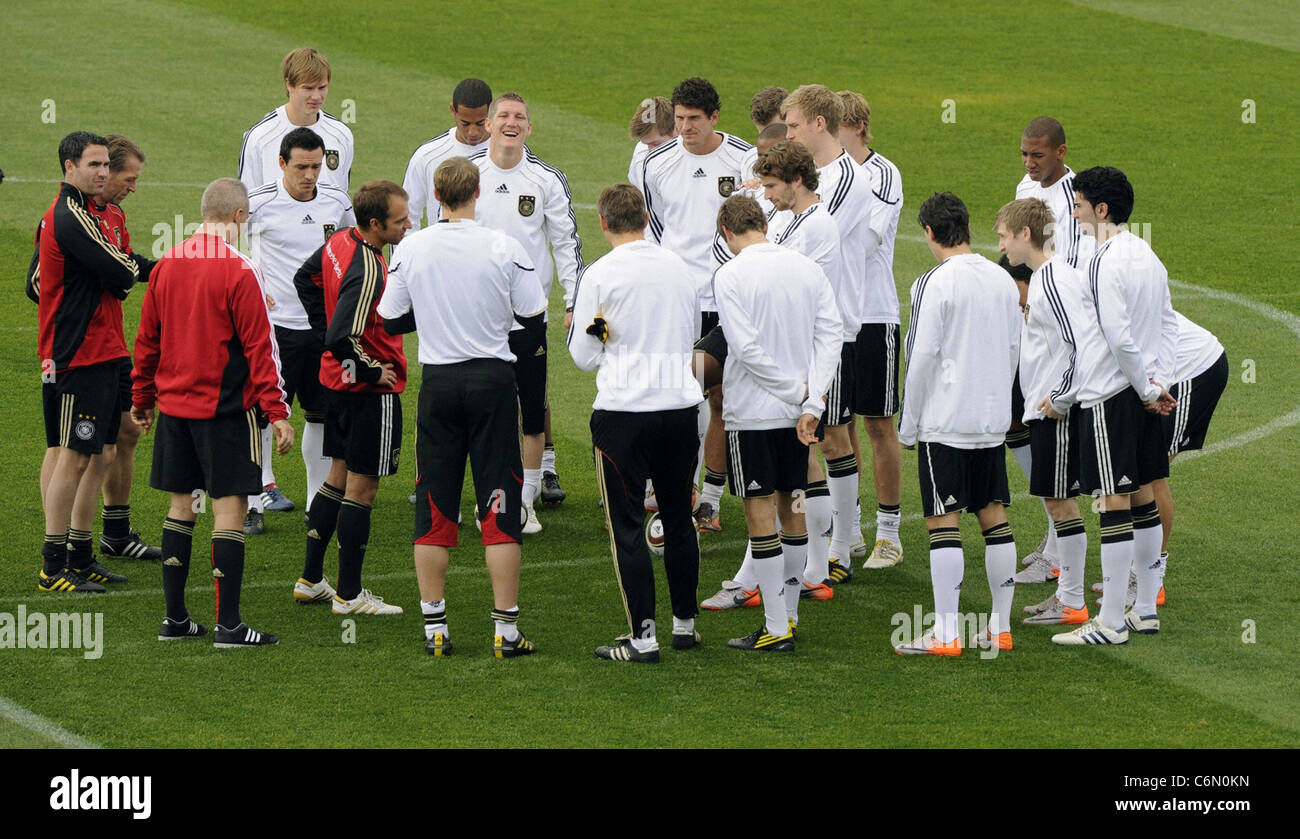 Germany players gather around coaches before a team practice session in ...