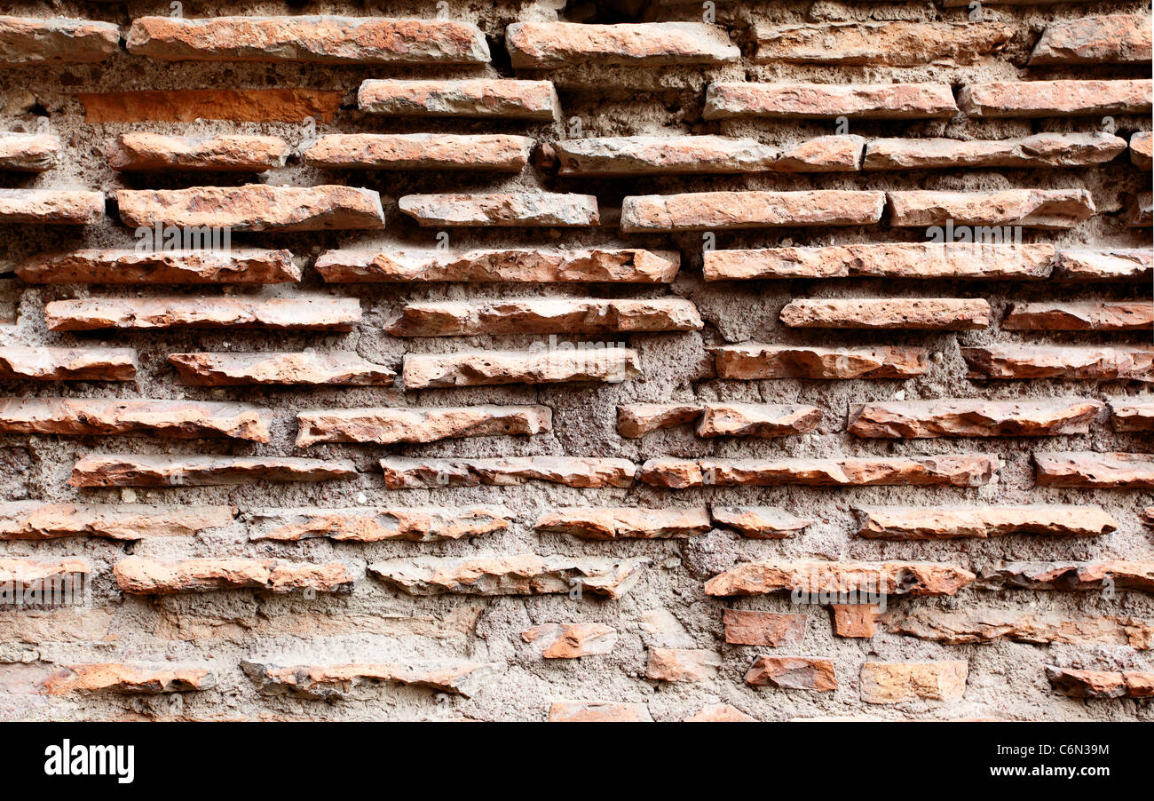 Ancient bricks of Colosseum in Rome, may be used as background Stock ...
