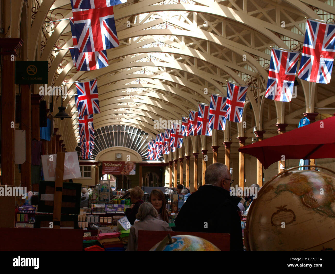 Union flags in the Barnstaple pannier market, Devon, UK Stock Photo - Alamy