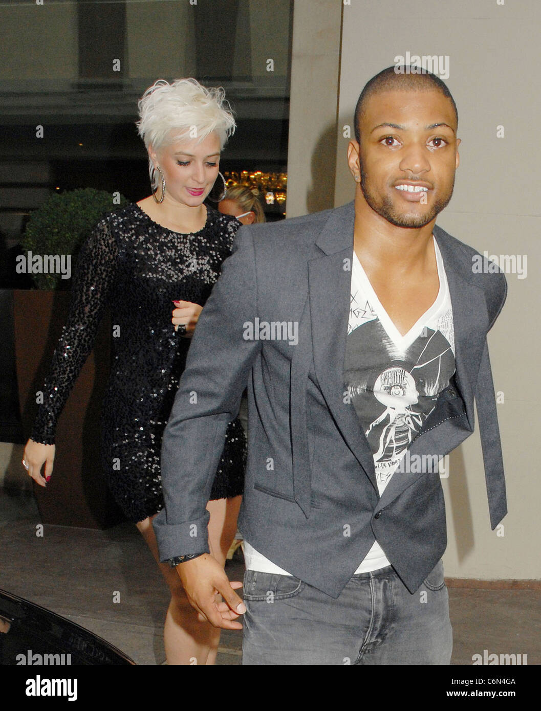 Jonathan 'JB' Gill of JLS and a female companion outside The May Fair Hotel London, England - 26 ...