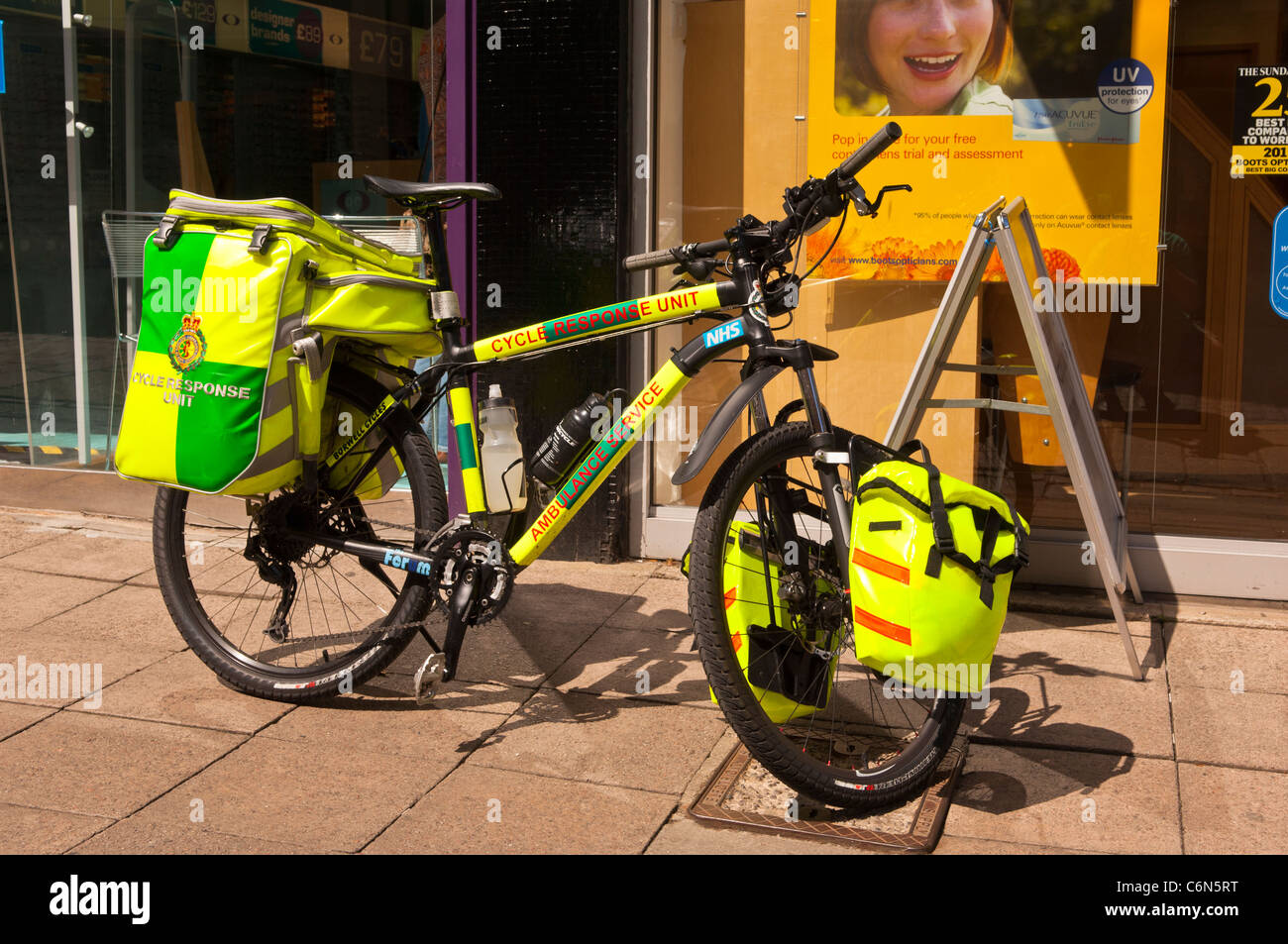 An ambulance service cycle response unit bicycle in the Uk Stock Photo ...