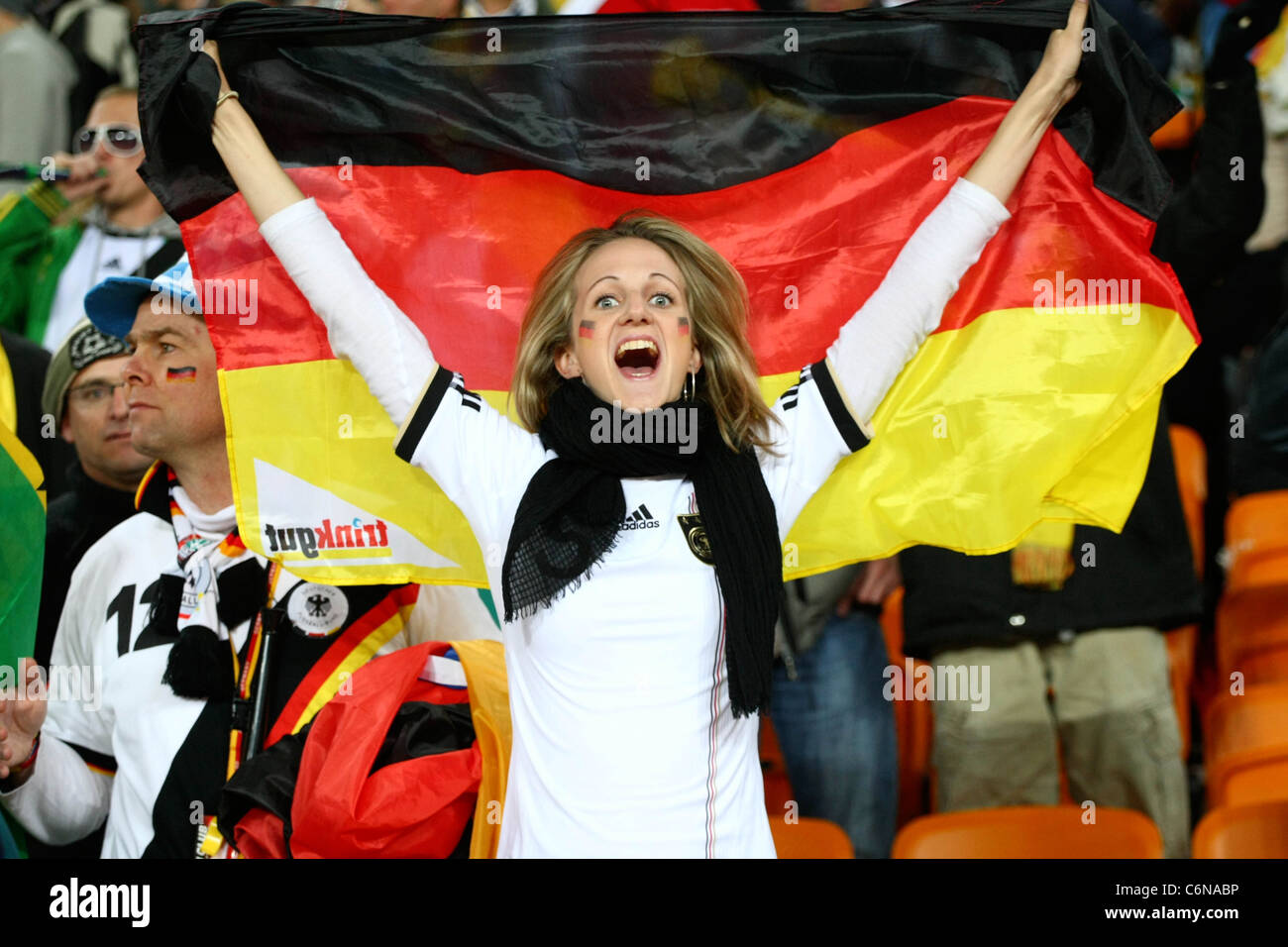 A female German fan shows her support during the match between Ghana ...