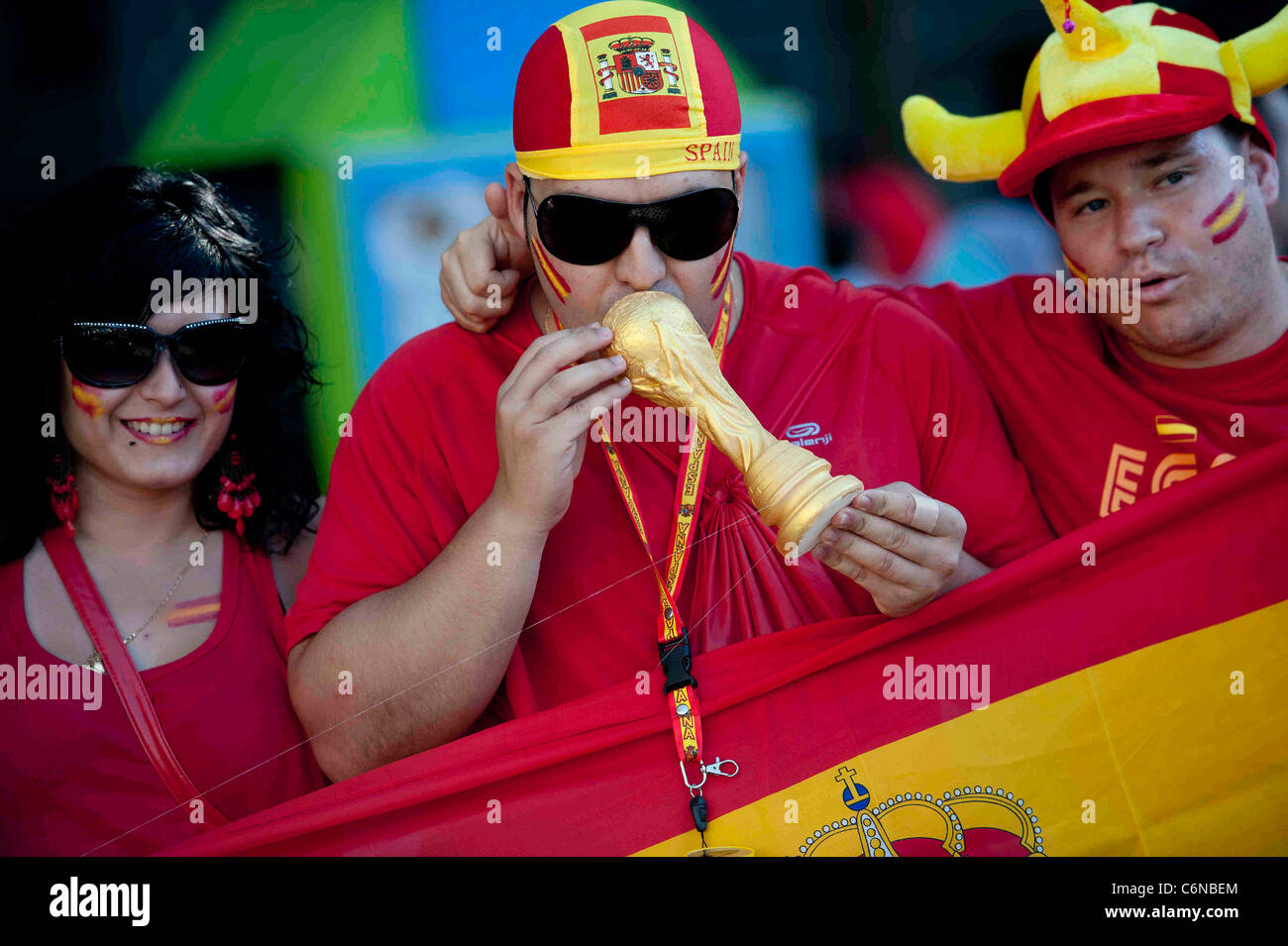 Crowds cheer for the Spanish team as they travel in an open bus as part ...