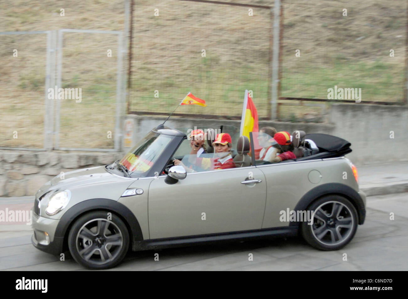 Princess Elena of Spain driving in her Mini Cooper, celebrating the ...