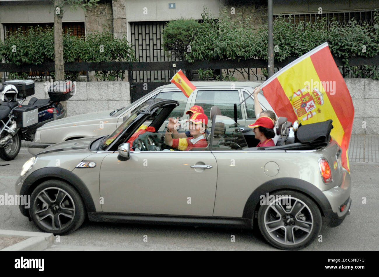 Princess Elena of Spain driving in her Mini Cooper, celebrating the ...