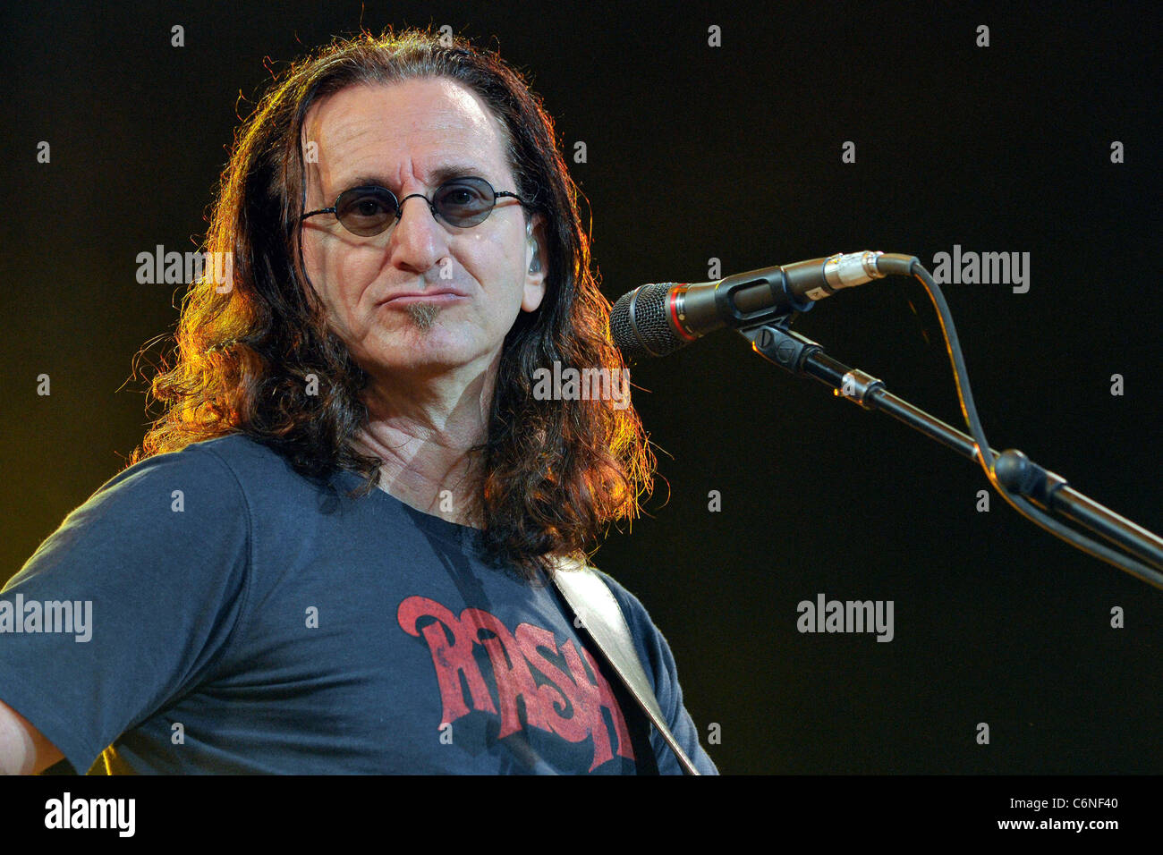 Geddy Lee of RUSH performing live on stage during 'Time Machine Tour ...