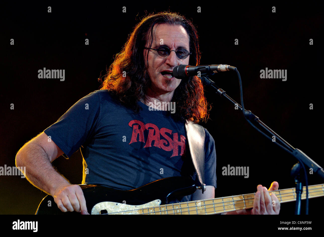 Geddy Lee of RUSH performing live on stage during 'Time Machine Tour ...
