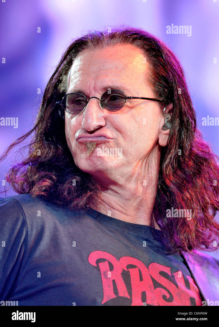 Geddy Lee of RUSH performing live on stage during 'Time Machine Tour ...