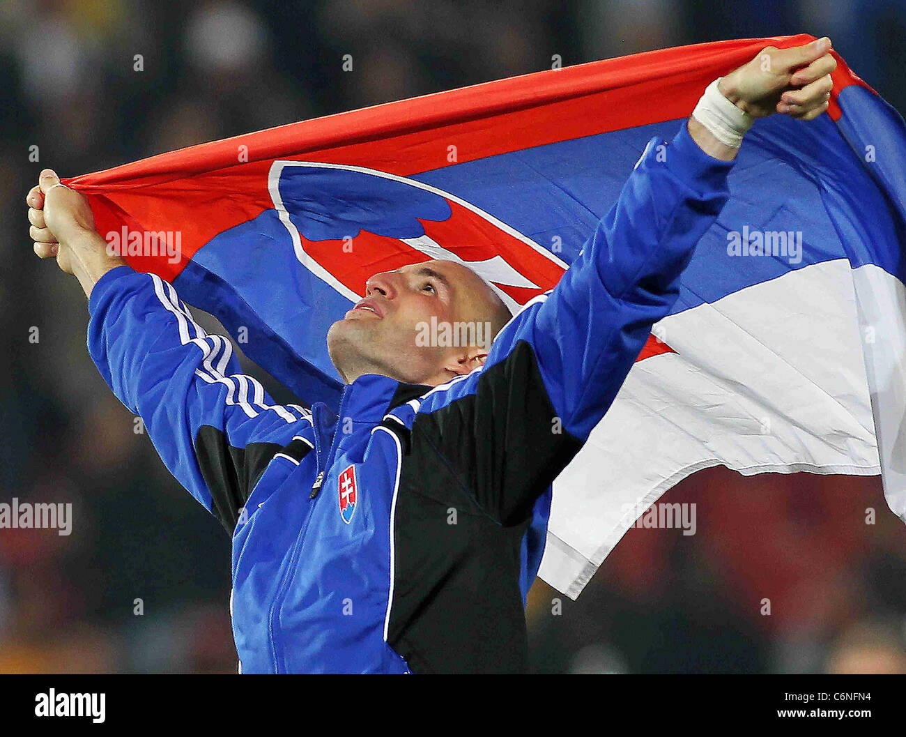 Vittek of Slovakia with his country flag. The World Cup holders Italy ...