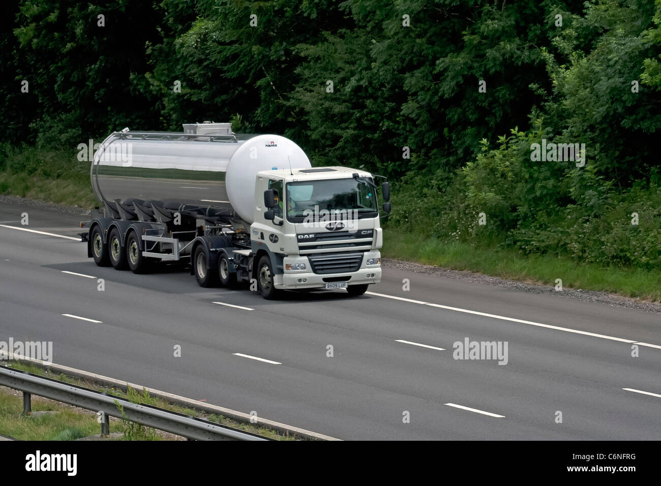 A tanker lorry on a motorway, commonly used for the transportation of ...