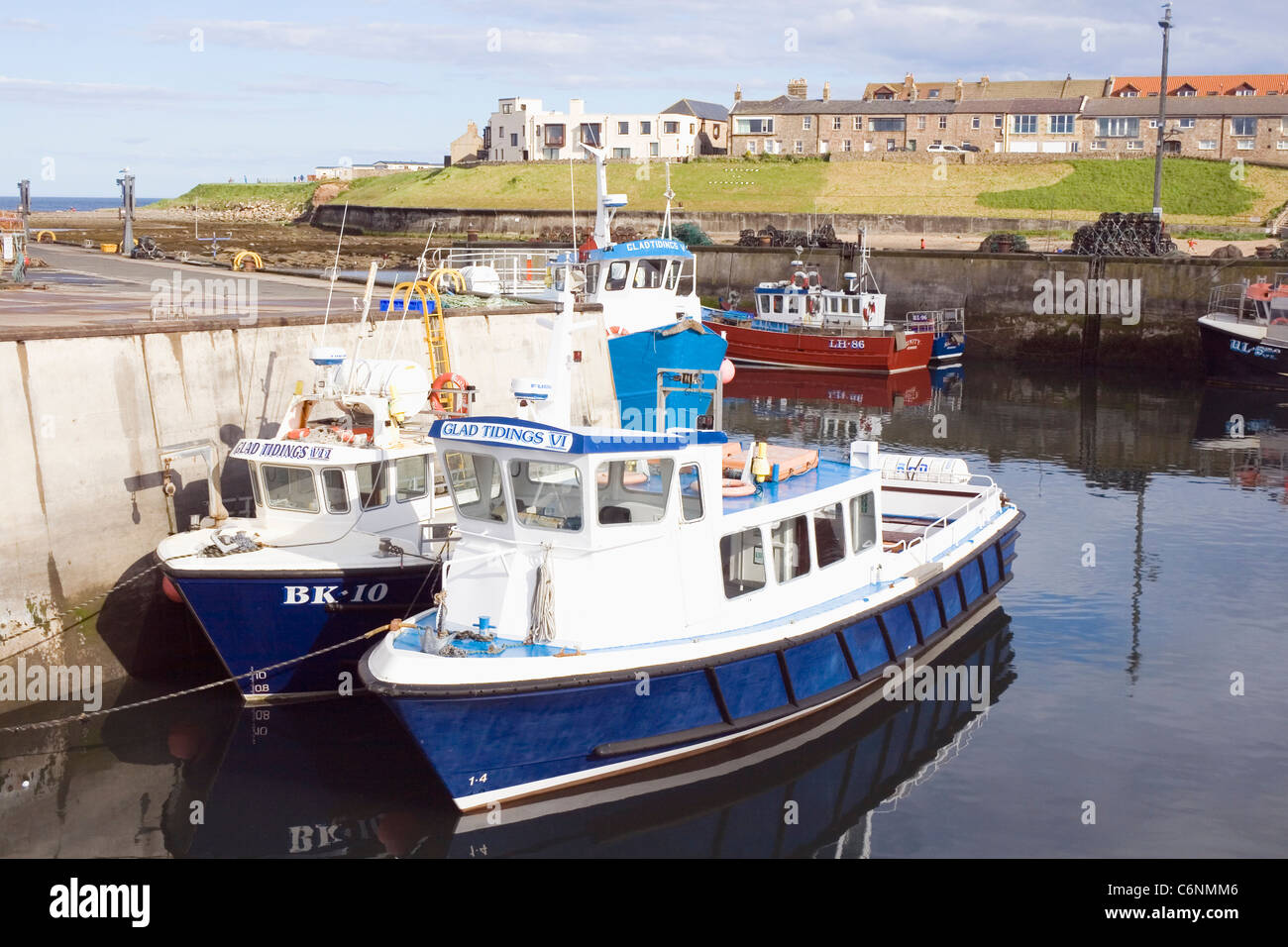 Seahouses, Northumberland, England. Fishing and excursion boats in the ...