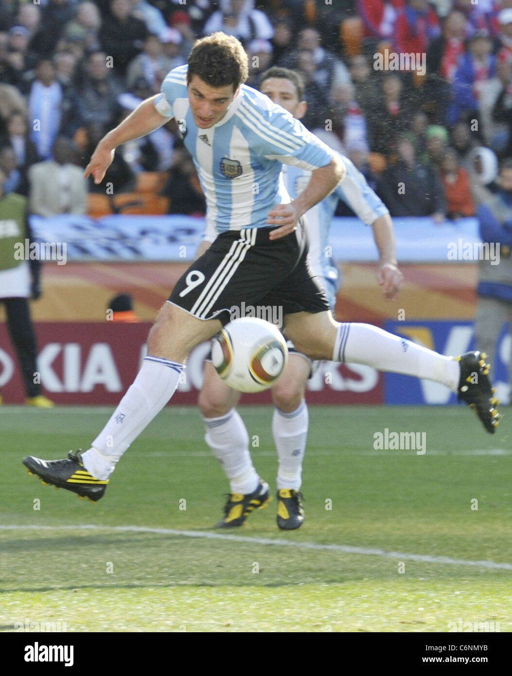 Argentina striker Gonzalo Higuain heads his side's fourth goal, marking ...