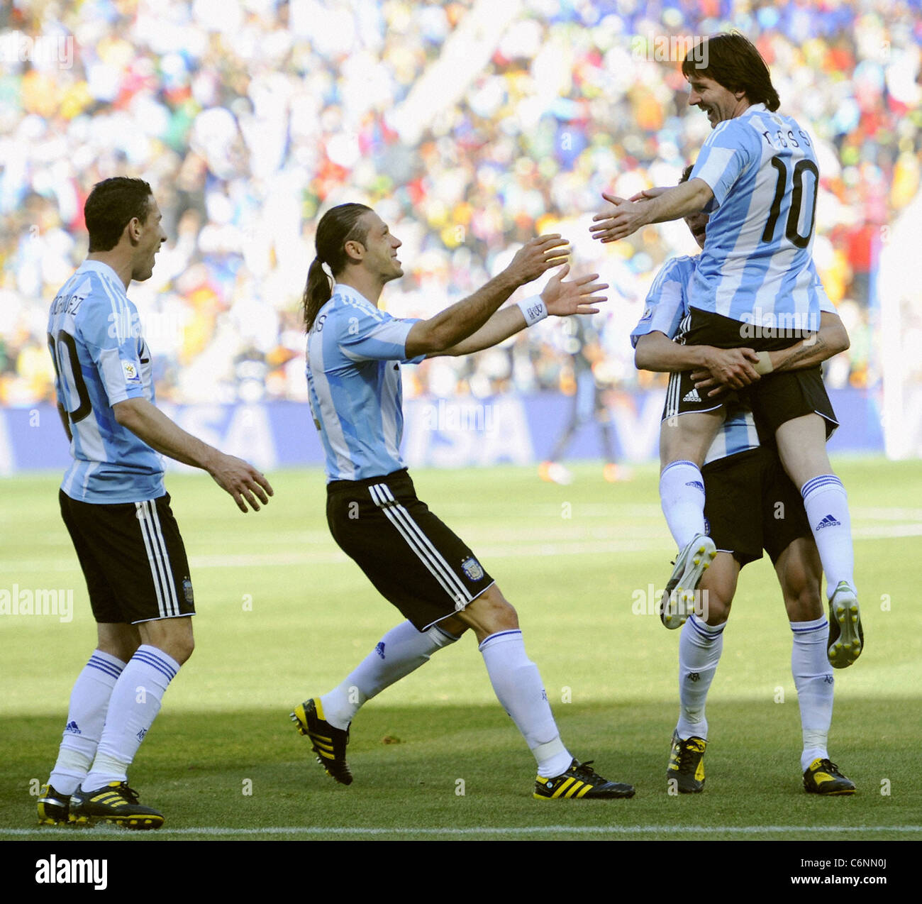 Argentina's Lionel Messi (10) celebrates with teammates after taking ...