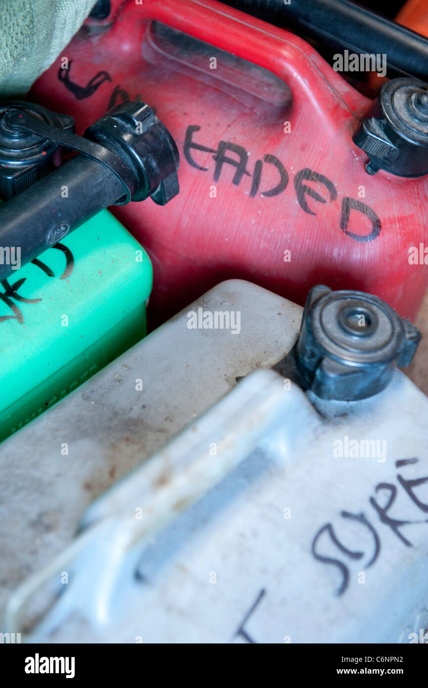 Labeled gas cans Stock Photo - Alamy