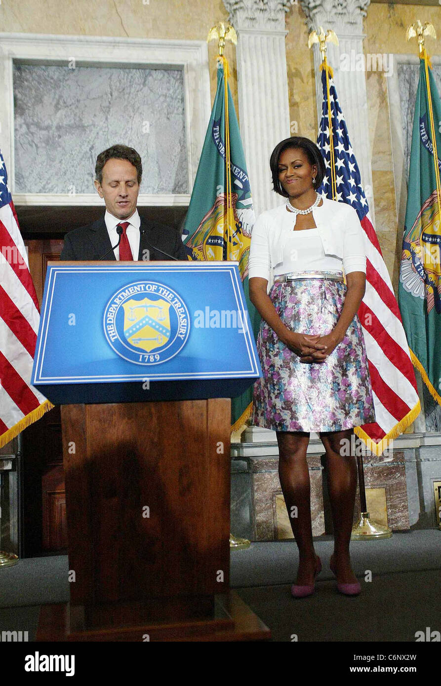 The Secretary of Treasury Timothy Geithner and Michelle Obama speaking ...