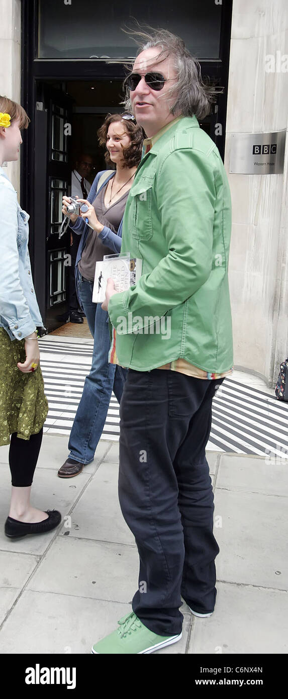 REM guitarist Peter Buck leaving the BBC Radio Two studios where he was ...