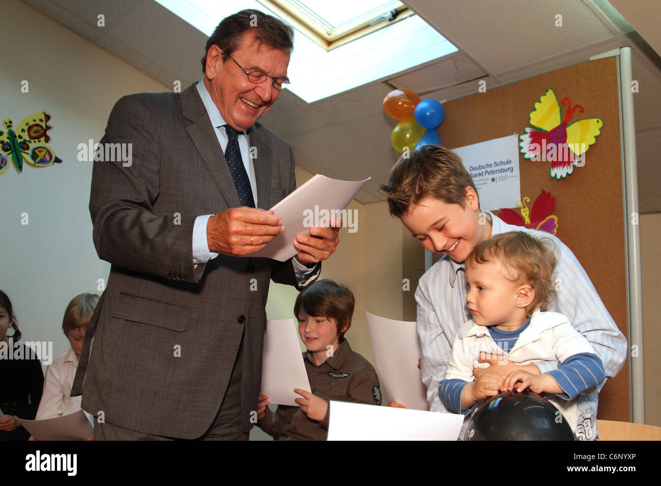 Former German Chancellor Gerhard Schroder visits a German school in St ... Former German Chancellor Gerhard Schroder visits a German school in St ...