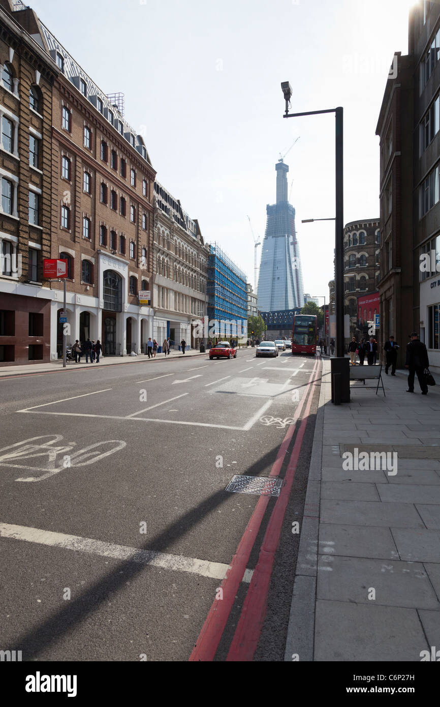 Street in London with the partially constructed 'Shard' building ...