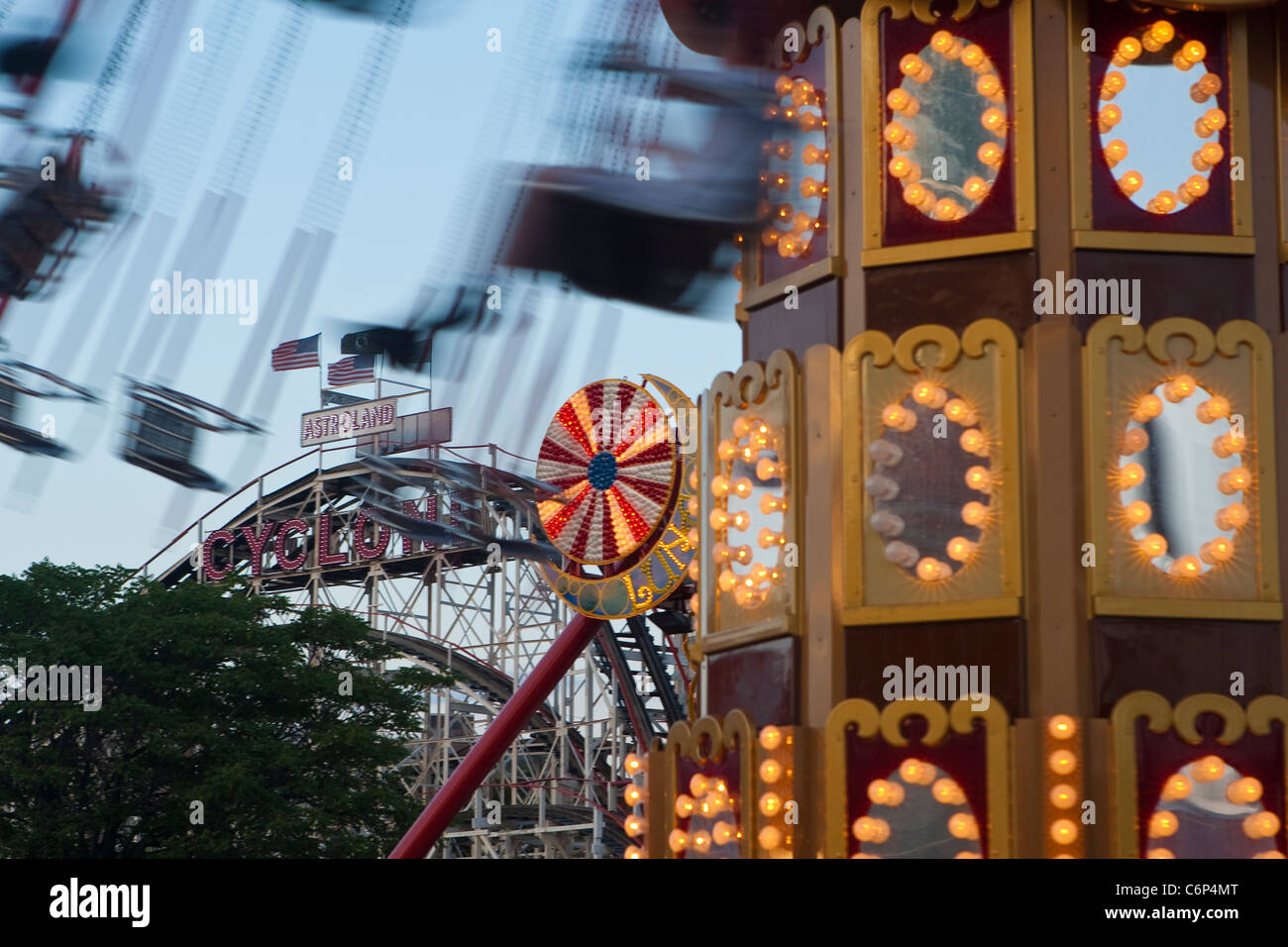 Coney Island Cyclone is seen through another amusement ride on Coney ...