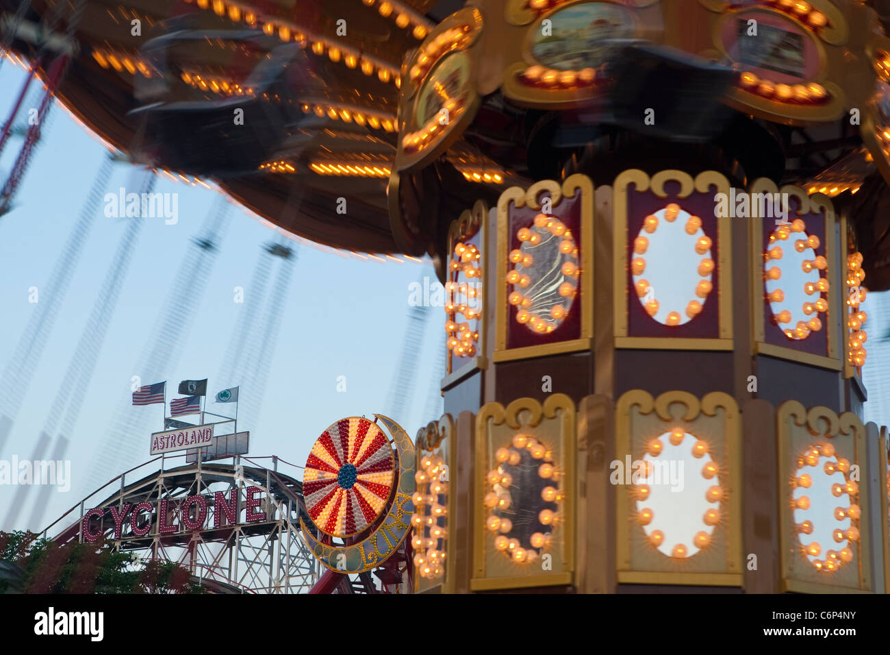 Coney Island Cyclone is seen through another amusement ride on Coney ...
