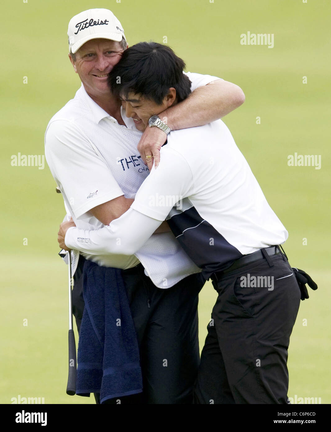 Korea's Jin Jeong receives a hug from his caddy after an impressive ...