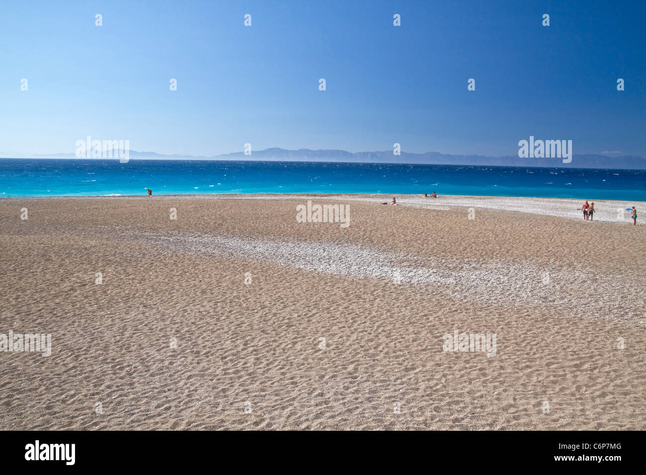 Sandy beach ocean blue sky hi-res stock photography and images - Alamy