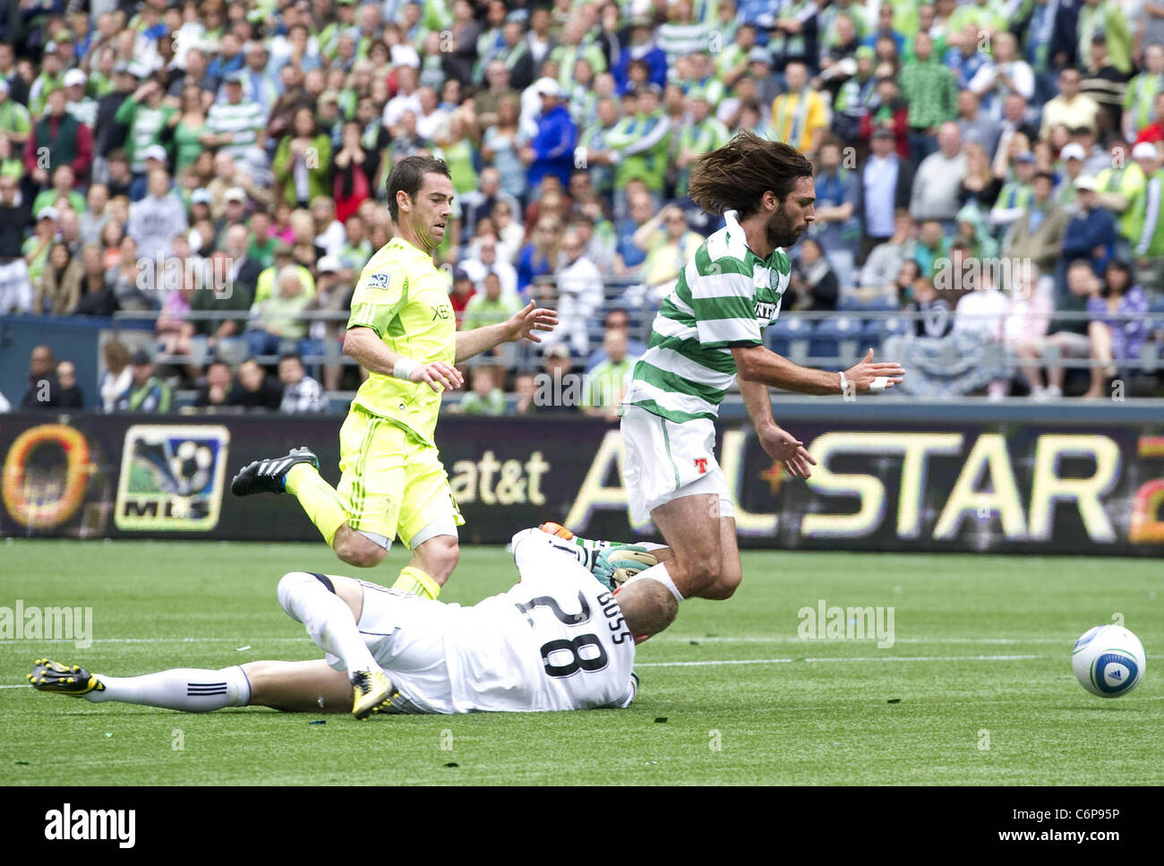 Seattle Sounders goalkeeper Terry Boss (bottom) brings down Georgios ...