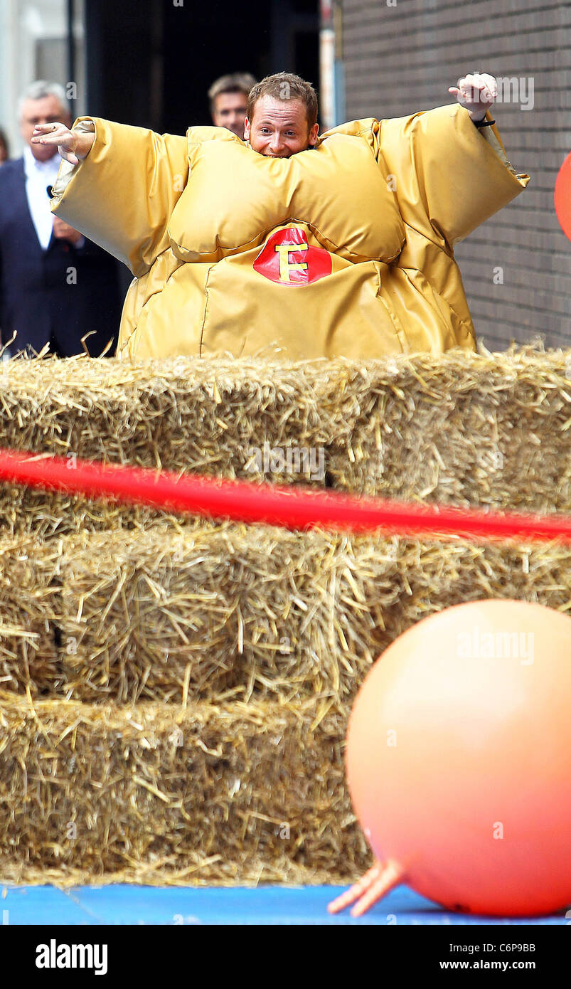 Joe Swash wearing a Sumo-wrestler costume while filming 'This Morning ...