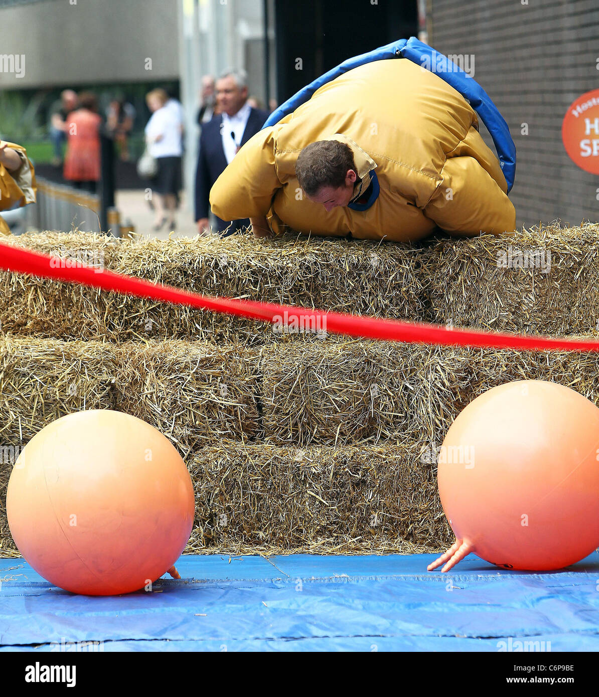 Joe Swash wearing a Sumo-wrestler costume while filming 'This Morning ...