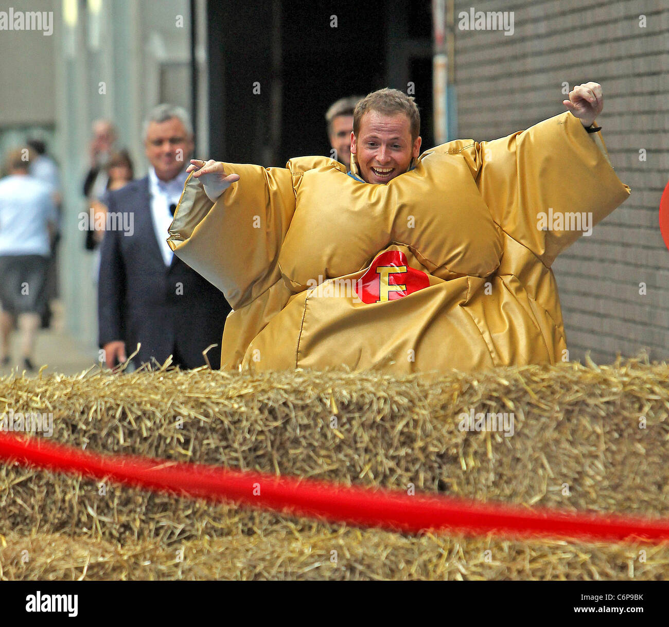 Joe Swash wearing a Sumo-wrestler costume while filming 'This Morning ...