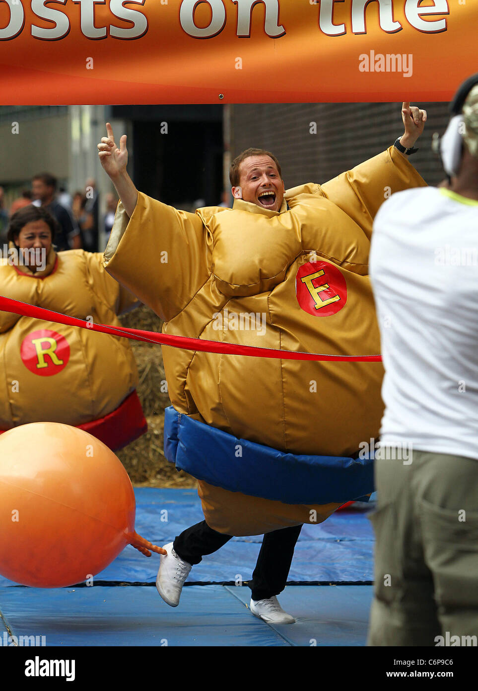 Joe Swash wearing a Sumo-wrestler costume while filming 'This Morning ...